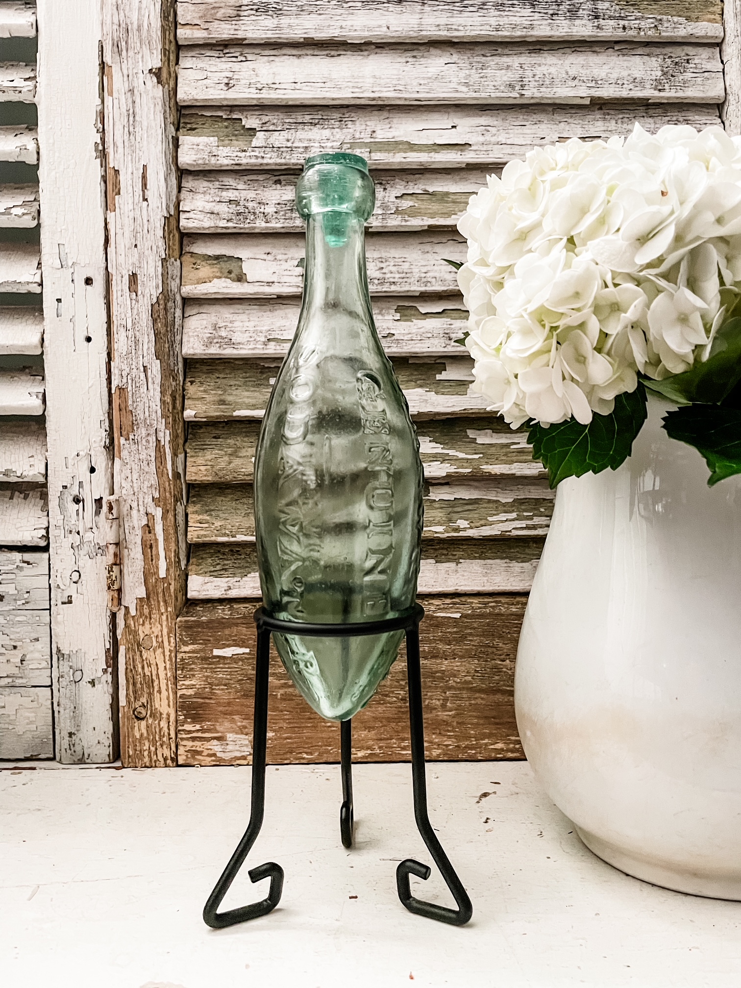 Blackdog Creations - Large Antique British Torpedo Bottle w/ Iron Stand & Glass topper, Aqua ...